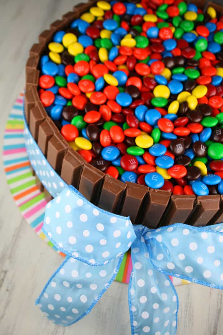 Buckets of M&M's Kit Kat Birthday Cake Recipe - Mom Loves Baking