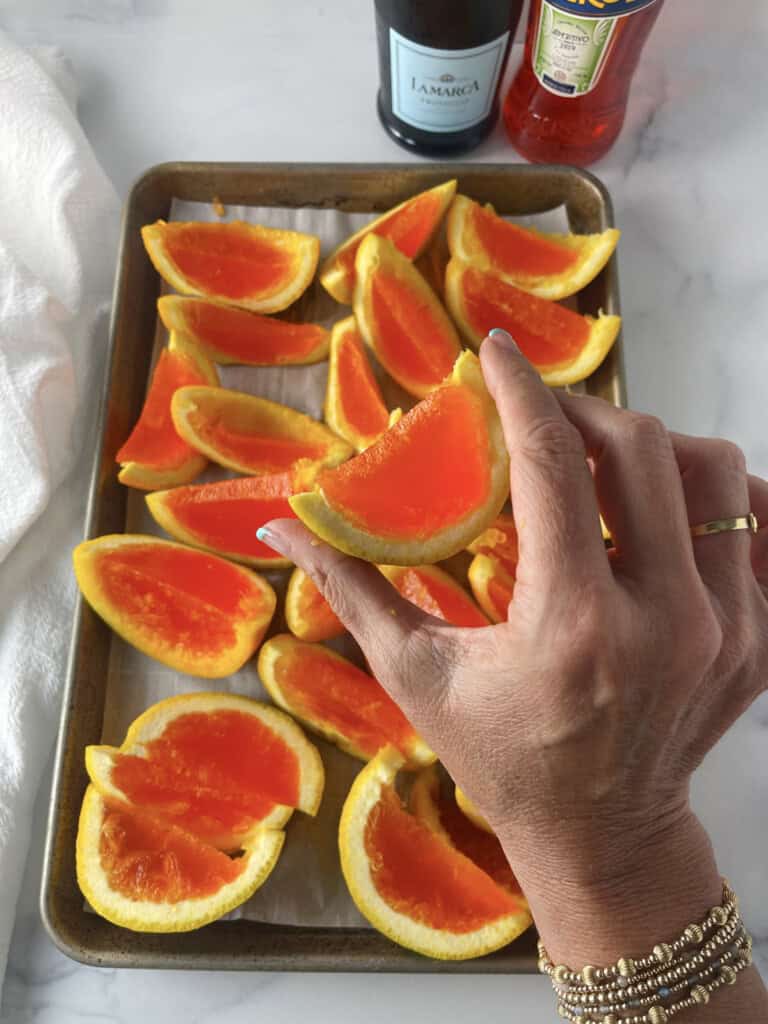 Aperol Spritz Jello Shot Recipe in Orange Peels - Mom Loves Baking
